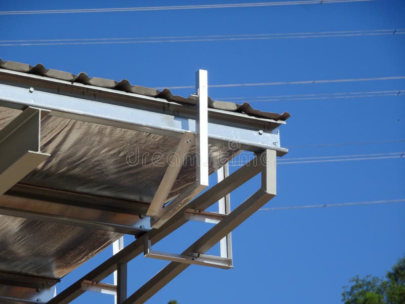 Installation of the Aluminum Cladding Frame at the End of the Roof is ...