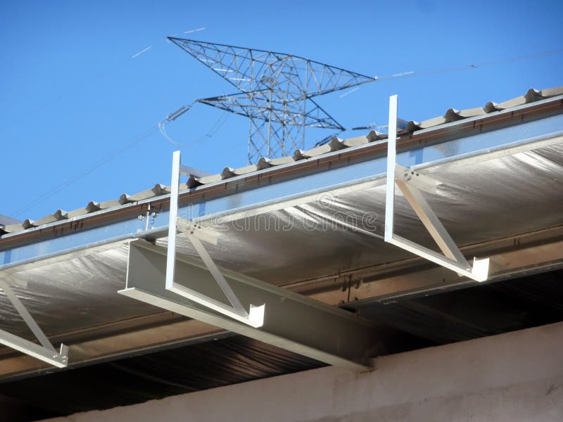 Installation of the Aluminum Cladding Frame at the End of the Roof is ...