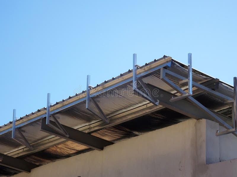 Installation of the Aluminum Cladding Frame at the End of the Roof is ...