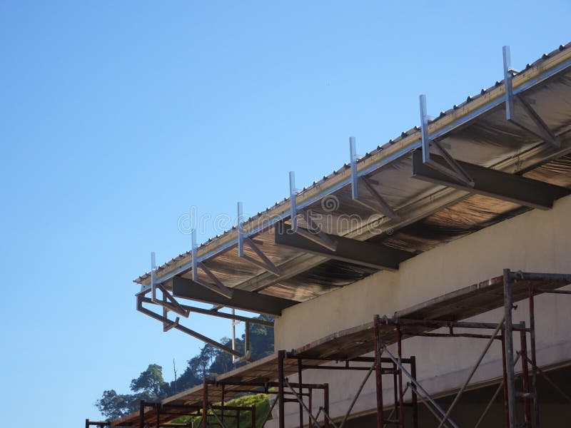 Installation of the Aluminum Cladding Frame at the End of the Roof is ...