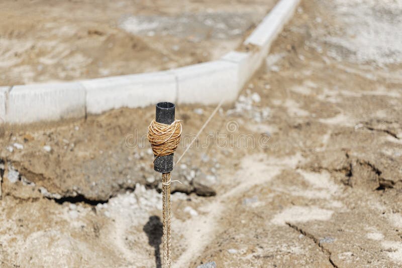 Installation of a Concrete Curbstone on a Rope Walkway. Tool for ...