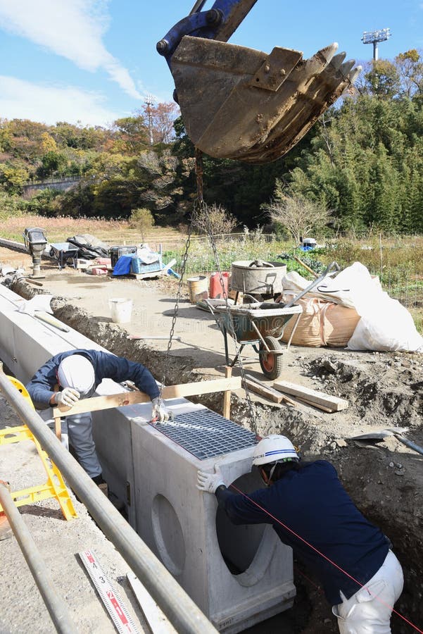 Street gutter construction stock photo. Image of concrete - 135171390