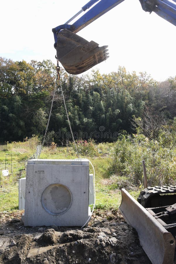 Installation Construction of Street Gutter on the Road Stock Photo ...