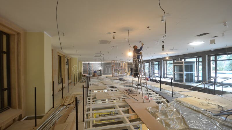 Installation of Decorative Arch on Floor in Light Hallway Stock Video ...