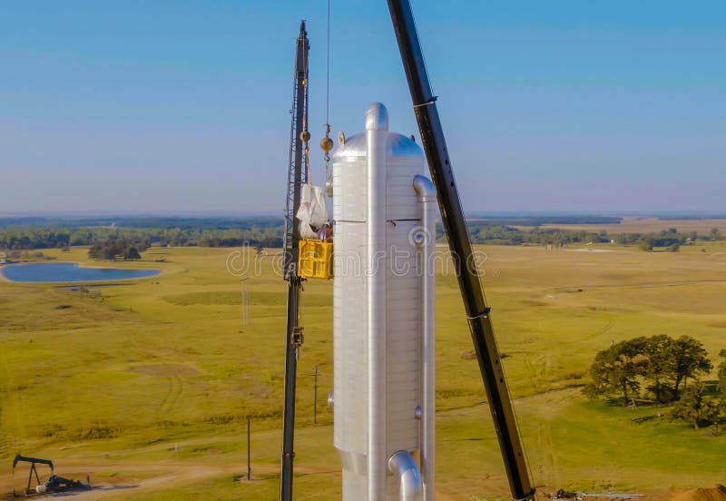 Installation of the Distillation Column with a Lift Crane. Construction ...