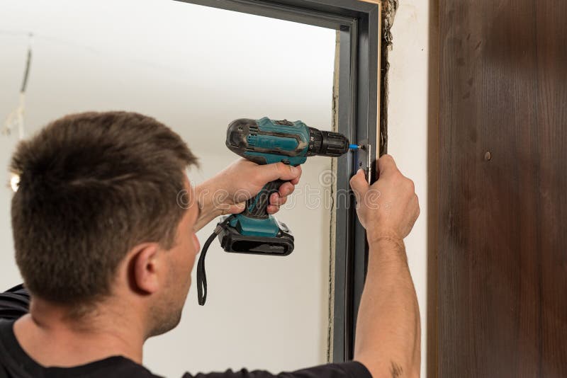 Installation of Door Hinges, Installation of Interior Doors Stock Image ...