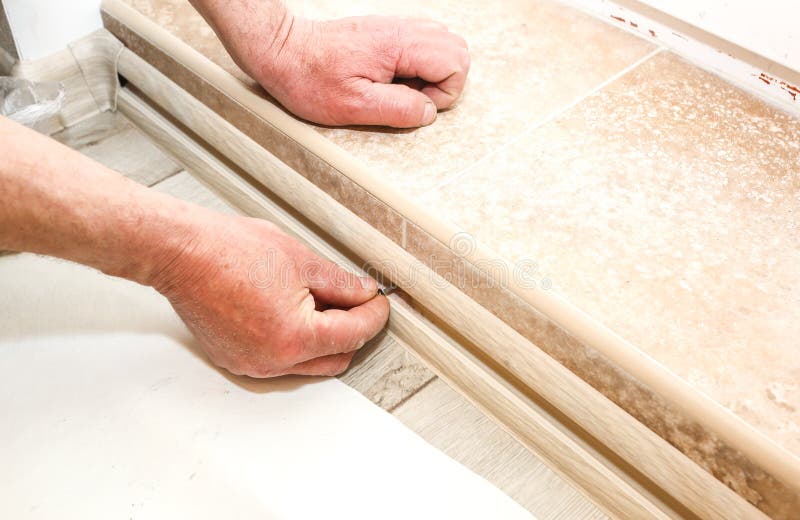 Installation of Doorstep Indoors. Renovation Works in the Flat Stock ...