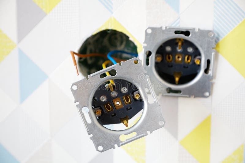 Installation of an Electrical Outlet, Work with an Electric Cable Stock ...