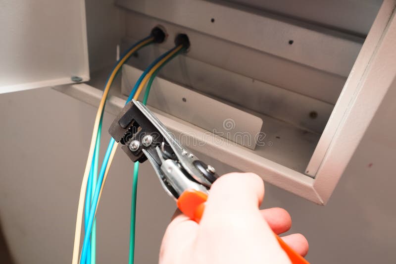 Installation of Electrical Panel. Electrician Working on Electric Panel ...