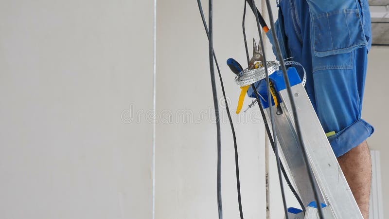 Installation of Electrical Wiring on Apartment Ceiling. Electrical ...