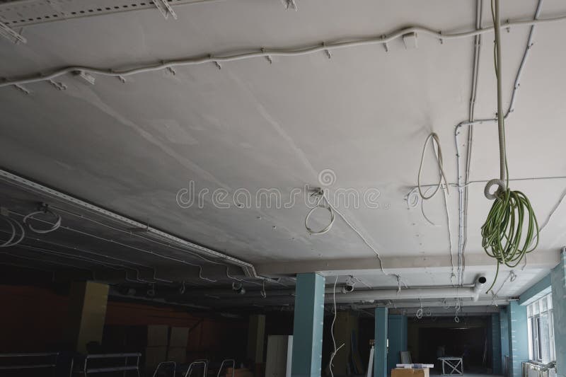 Installation of Electrical Wiring on the Ceiling. Electrical Cable ...