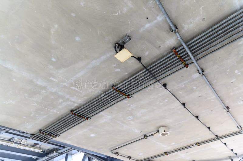 Installation of Electrical Wiring on the Ceiling. Electrical Cable ...