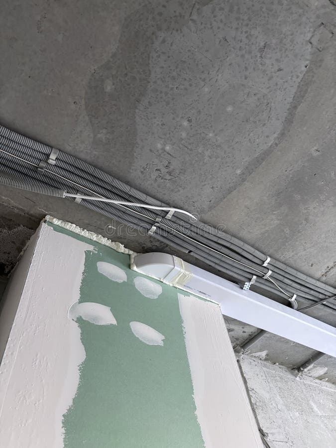 Installation of Electrical Wiring on the Ceiling. Stock Image - Image ...