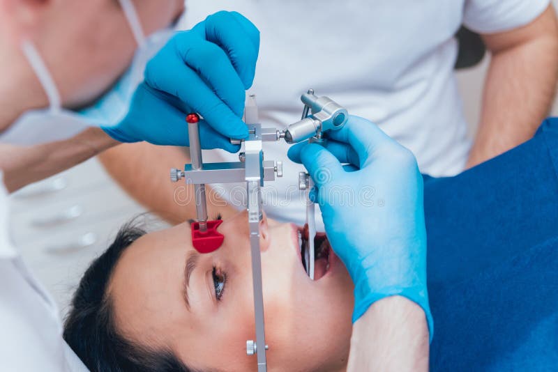 Installation of the Face-bow. Functional Diagnostics. Modern Technology ...