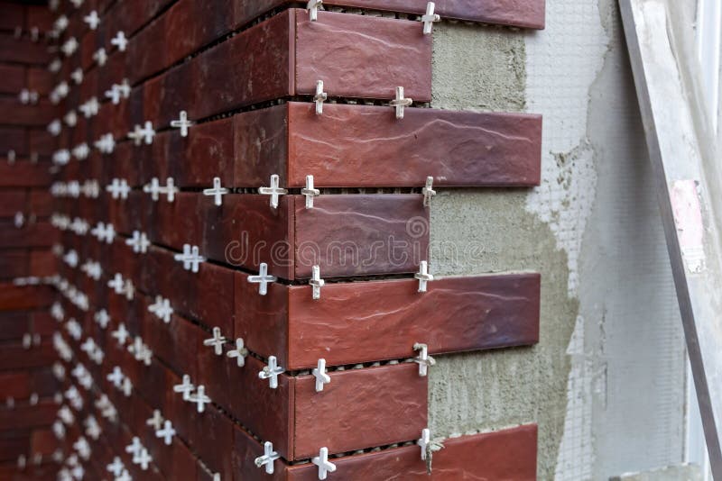 Installation of Facing Facade Tiles Stock Photo - Image of craftsman ...