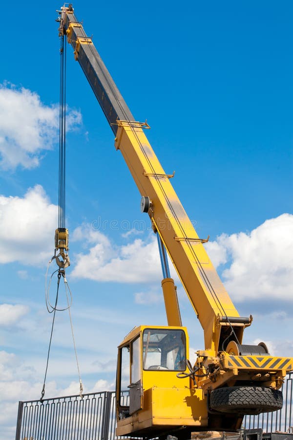 Installation of a Fence by a Mobile Crane Stock Photo - Image of ...