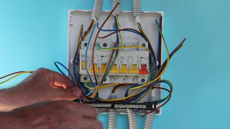 Installation of Fuse Box Panel with Circuit Breakers in House. Stock ...