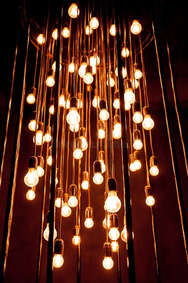 Installation Group of Light Bulbs in the Dark Stock Image - Image of ...