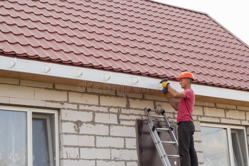 Installation of Gutter System Stock Image - Image of holder, pipe: 96841423