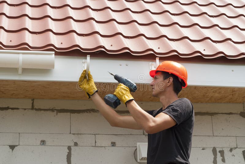 Installation of Gutter System Stock Image - Image of drain, roofing ...