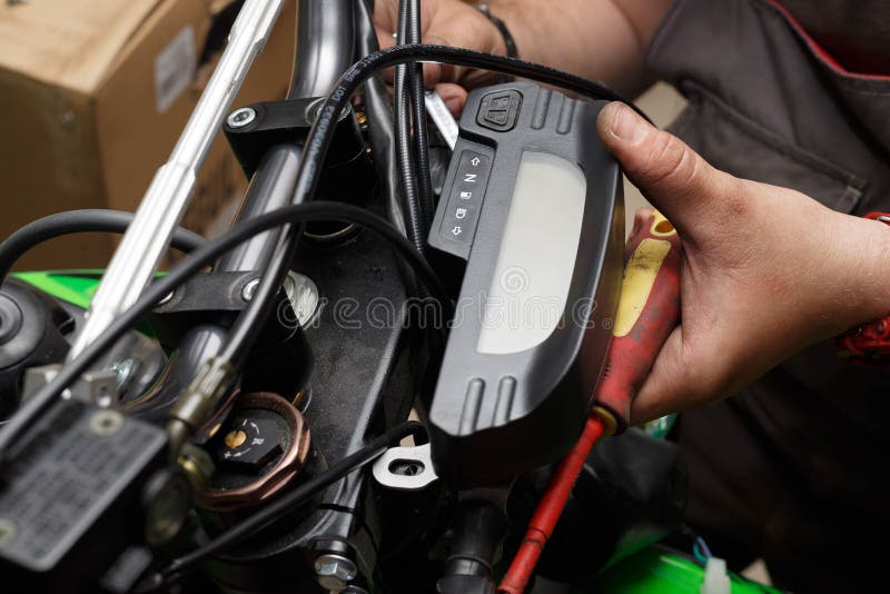 Installation of the Instrument Panel on the New Motorcycle in the ...