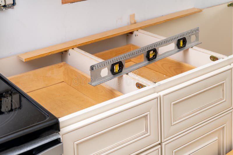 Installation at the Level of Kitchen Cabinets Stock Image - Image of ...