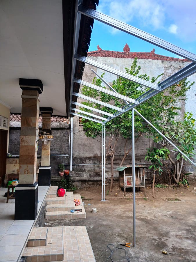 Installation of Lightweight Steel Frame for Simple House Canopy Stock Photo - Image of attached ...