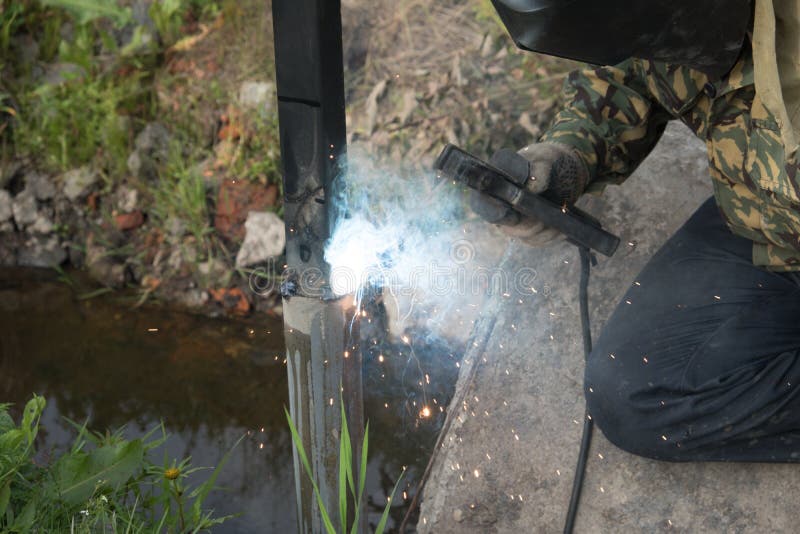 Installation of a Metal Column Using a Welding Machine Stock Image ...