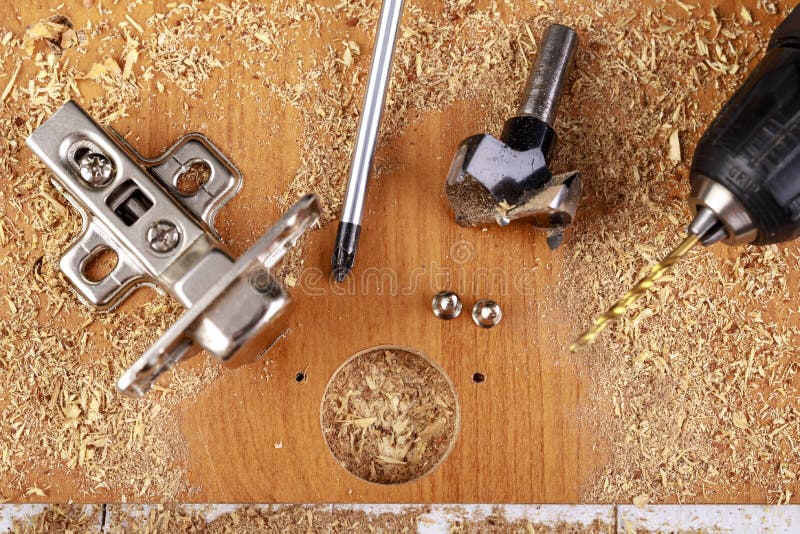 Installation of Metal Hinges with a Soft Close in a Chipboard. Minor ...