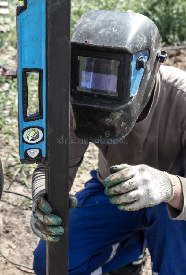 Installation of Metal in the Soil for the Gate Stock Image - Image of ...
