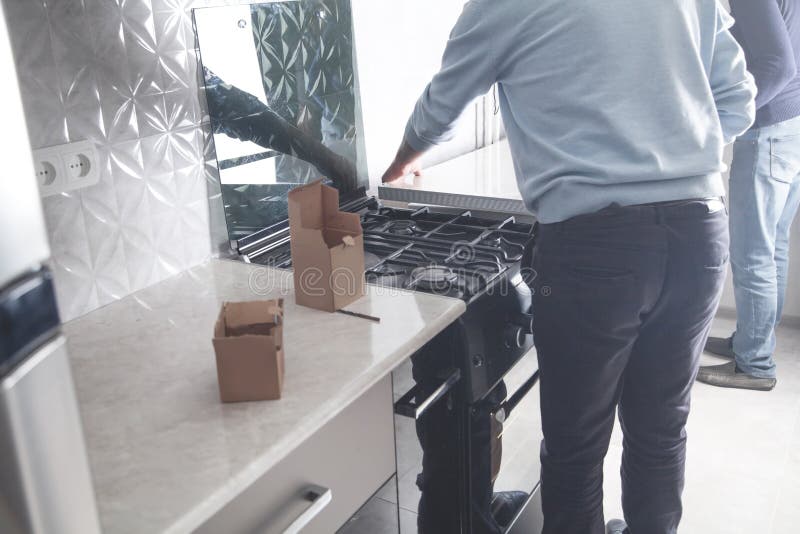 Installation of Modern Kitchen Furniture Stock Image - Image of worker ...