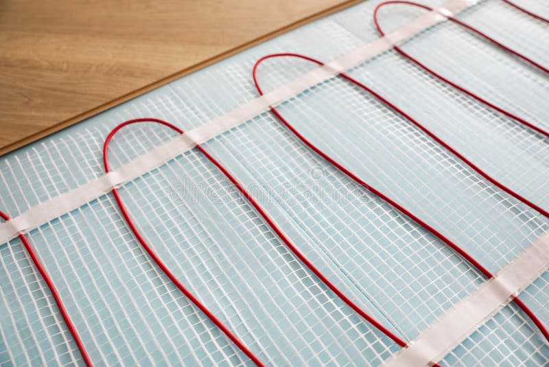 Installation of Modern Underfloor Trace Heating System Indoors, Closeup ...