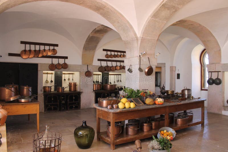 Kitchen In A Medieval Castle With Kitchenware, Furniture And Food On ...