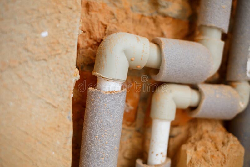 Installation of New Plastic Pipes in Gates on the Wall, Repair Work on ...