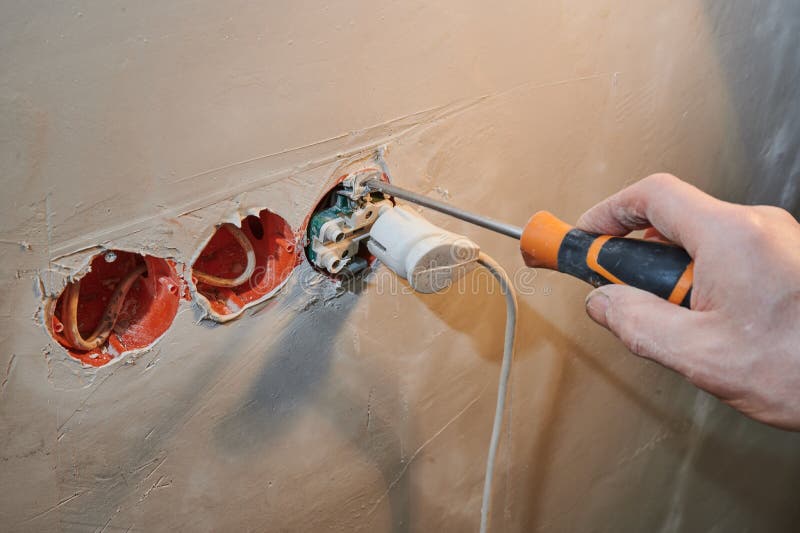 Installation of a New Socket in a Freshly Plastered Wall with Plug ...
