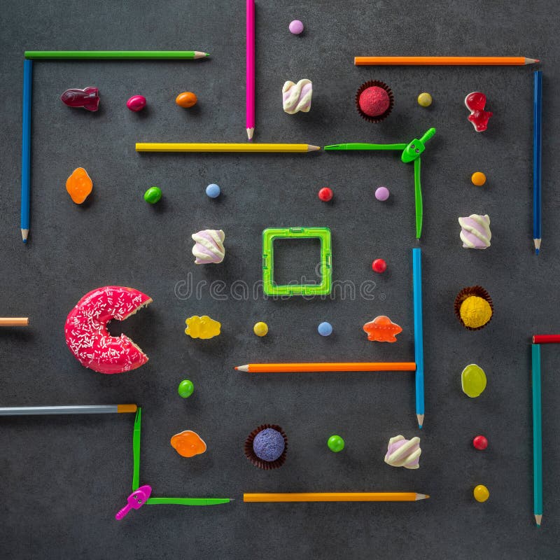 Installation of Pac Man Computer Game with Red Donut and Jelly Sweets ...