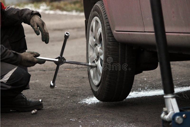Installation of Passenger Car Wheel and Replacement on Winter Tire ...