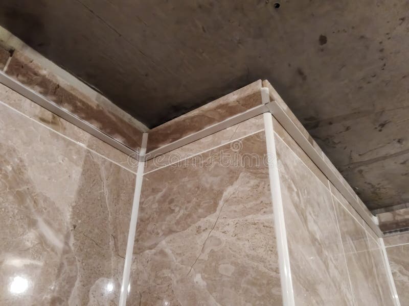 Installation of a Perimeter Wall Angle Stock Image - Image of works ...