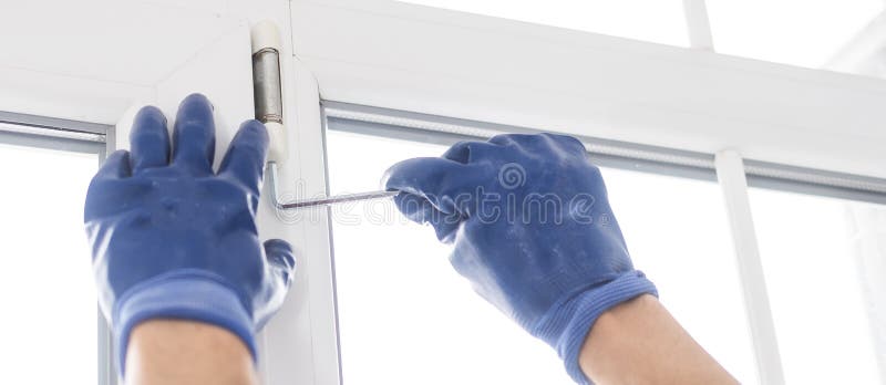 Installation of Plastic in a Frame House, the Builder Screws the Window ...