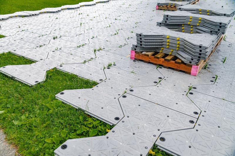 Installation of Plastic Portable Floor To Protect the Lawn Stock Photo ...