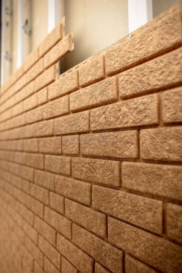 Installation of Plastic Siding Under the Brick Stock Image - Image of ...