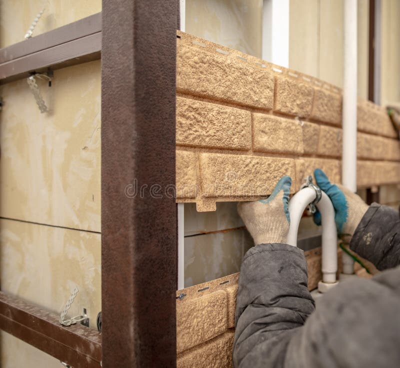 Installation of Plastic Siding Under the Brick Stock Image - Image of ...
