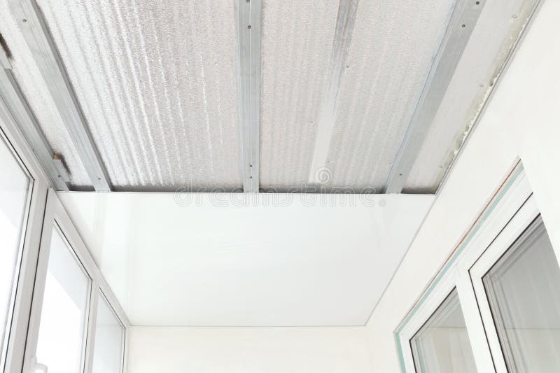 Installation of Plastic White Panels on the Ceiling Stock Photo - Image ...
