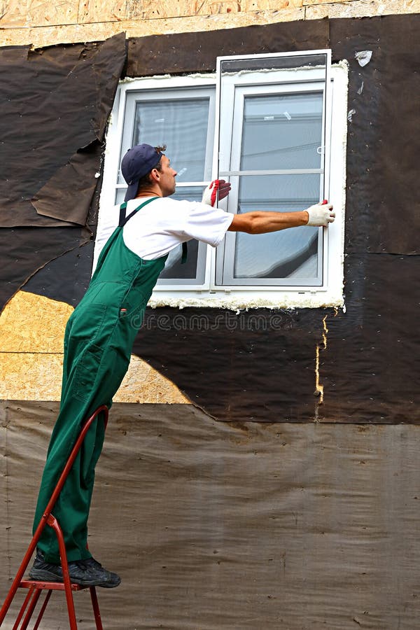 Installation of Plastic Windows Stock Photo - Image of coverall ...