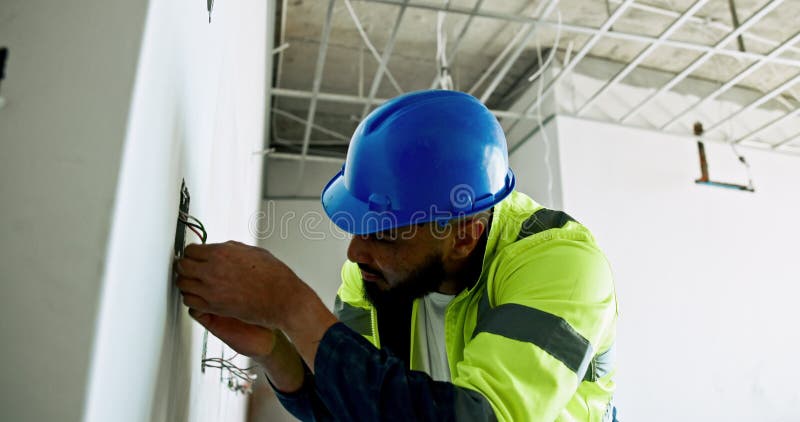 Installation, Plug and Wires with Electrician Man on Building Site for ...