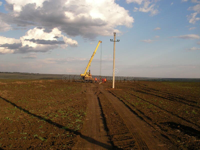 Installation of a Power Line Stock Photo - Image of installation ...