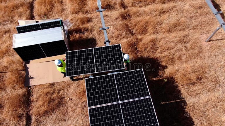 Installation Process of Solar Panel Banks with Machinery Stock Image ...