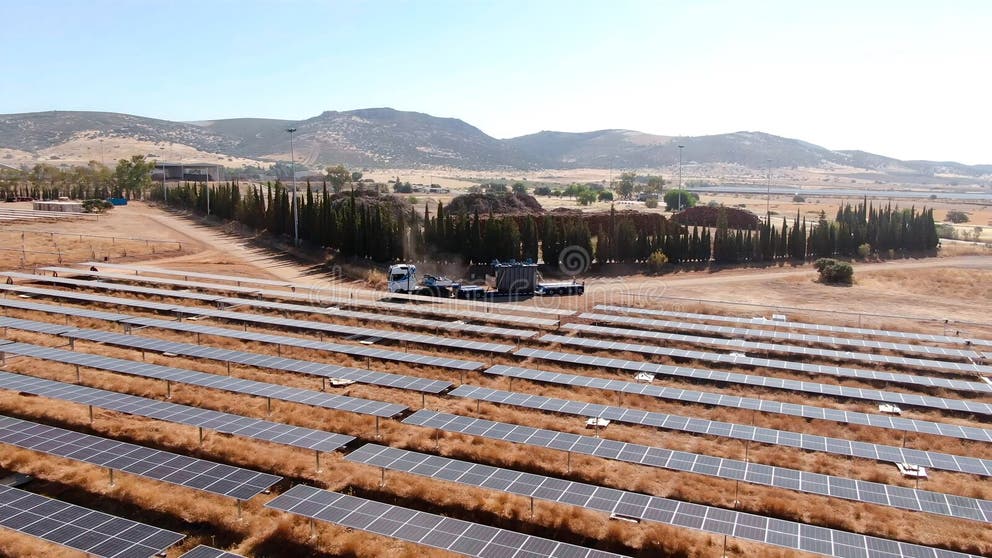 Installation Process of Solar Panel Banks with Machinery Stock Photo ...