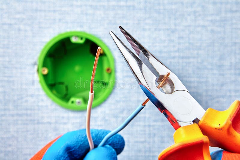 Installation of Round Electrical Box with Pliers Stock Image - Image of ...
