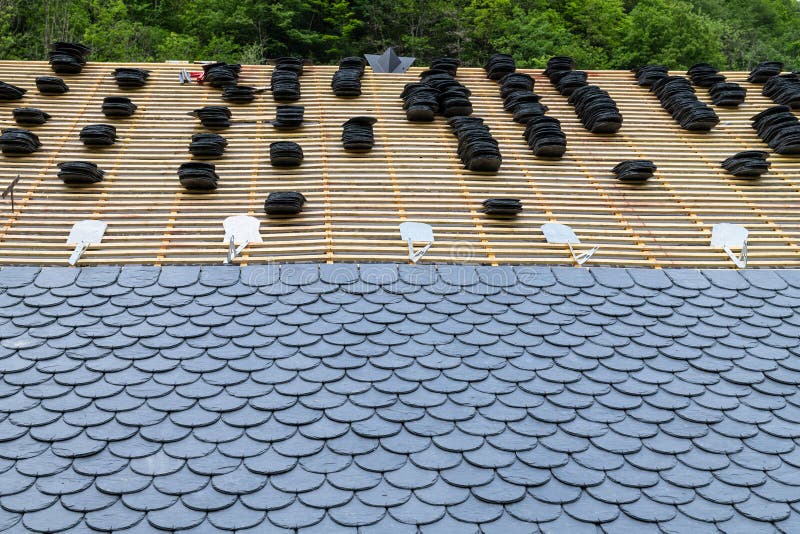Installation of Slate Roofing Tiles on a Roof Stock Photo - Image of ...